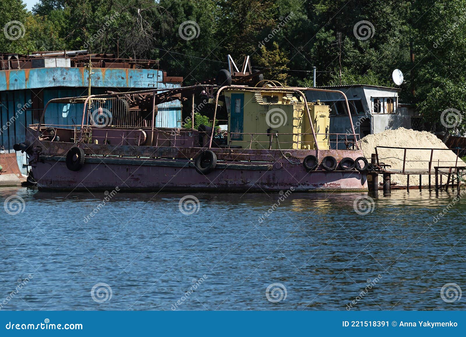 Abandoned Rusty Ship on the River Bank. Destroyed Boat and Pier Stock ...