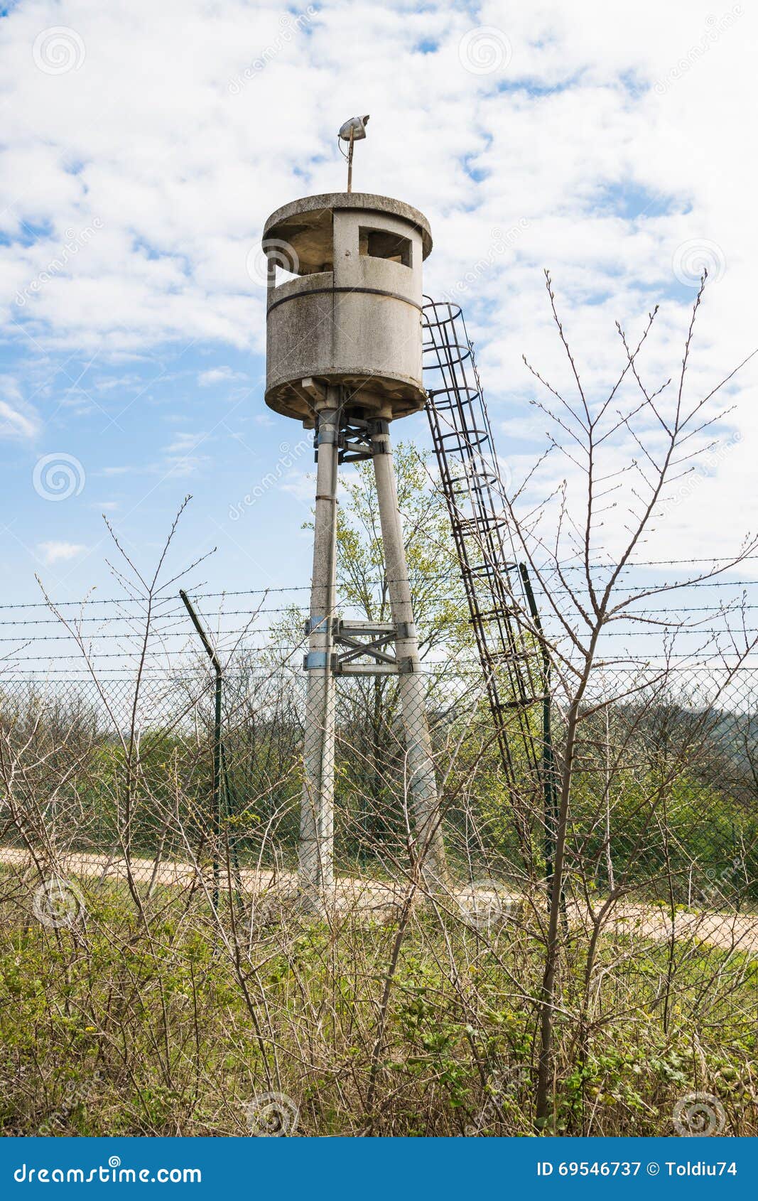 Abandoned Sentry Box Tower by a Net with Barbed Wire. Stock Image ...