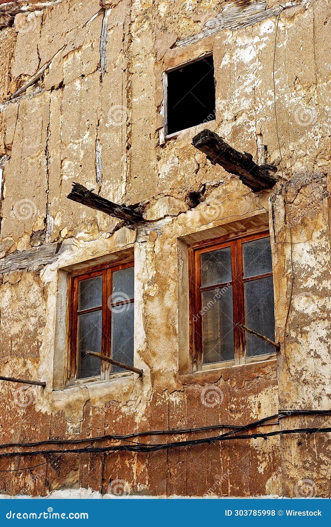 Deteriorated Building with Two Windows Stock Photo - Image of windows ...