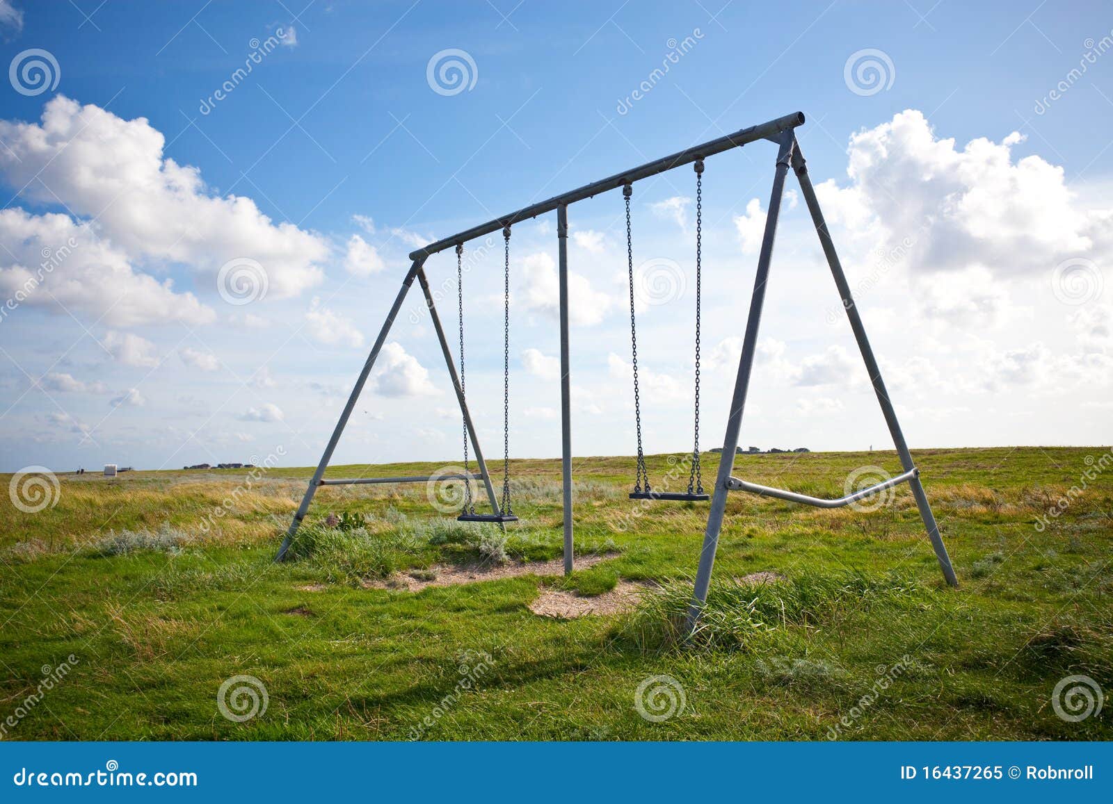 Abandoned swing on a field stock image. Image of grass - 16437265