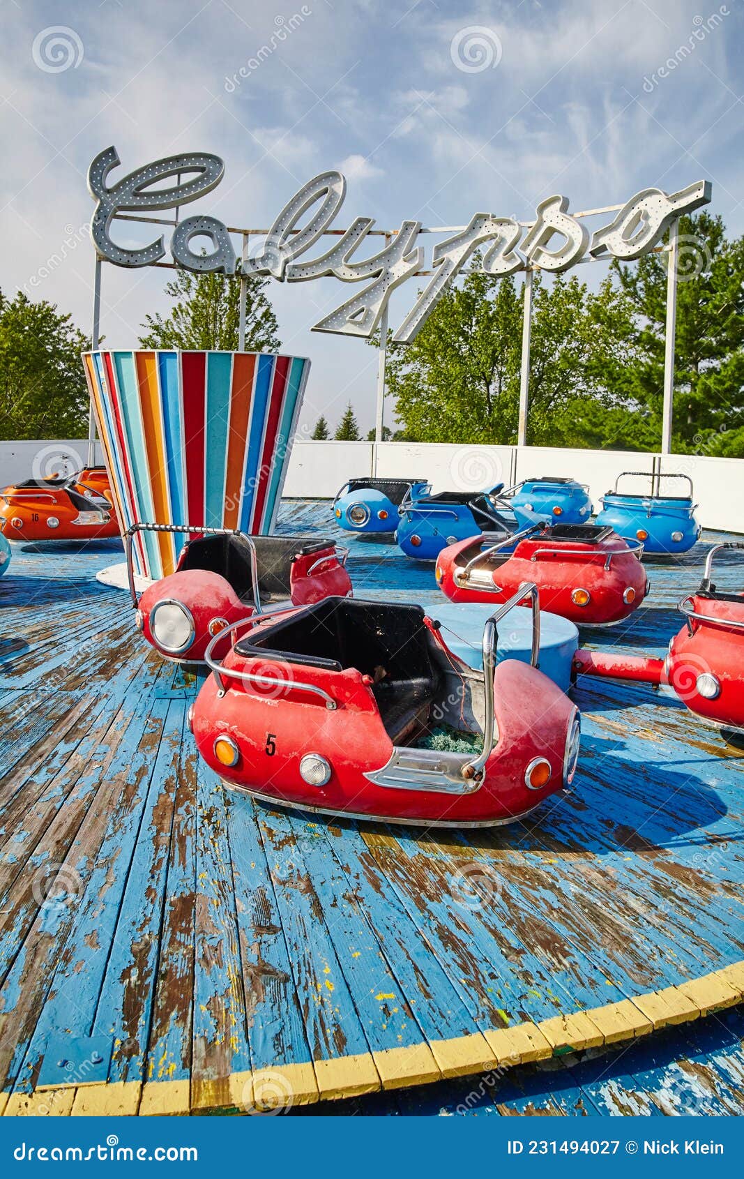 Abandoned Theme Park Red Bumper Cars on a Peeling Blue Base Editorial ...