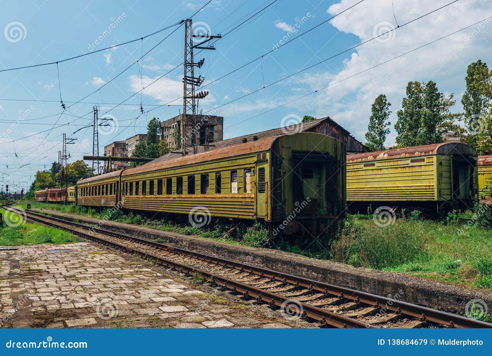 Abandoned Train on Overgrown Rail. Old Rusty Railway Carriages in Ghost ...