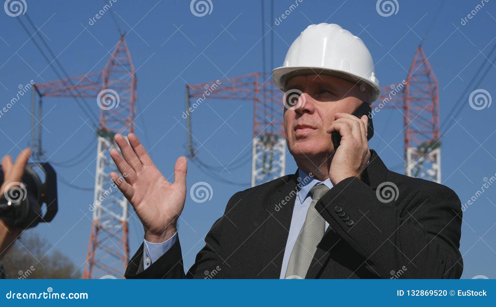 Engineer Interview Using Cell Phone Talking with Maintenance Team Stock ...