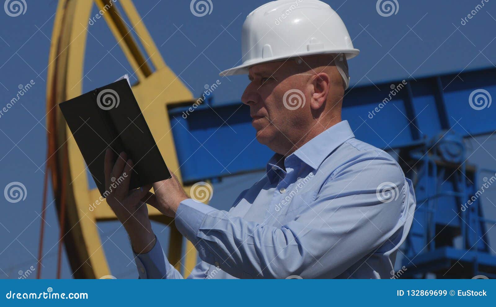 Petroleum Engineer Working in Extracting Oil Industry Using Agenda ...