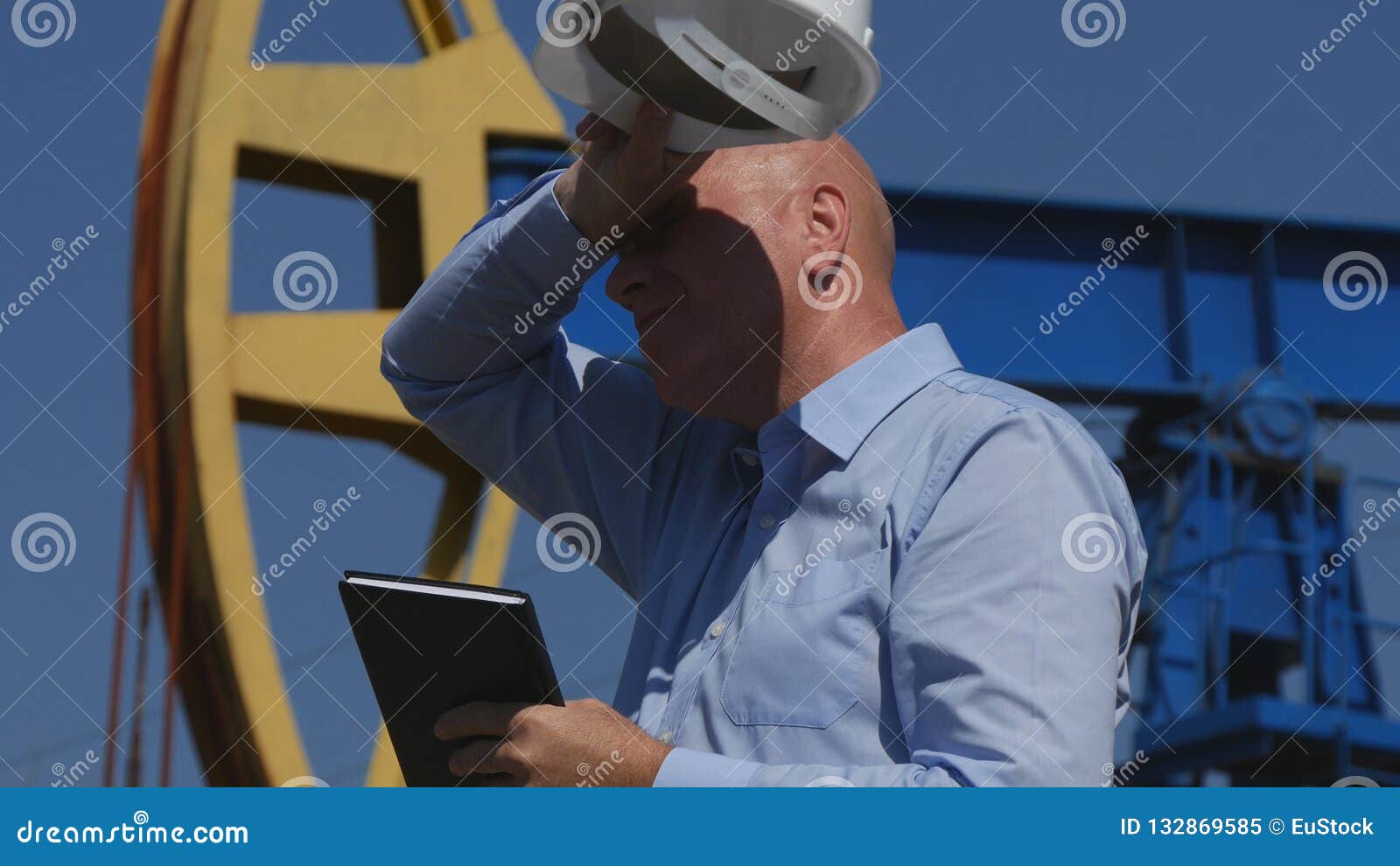 Tired Petroleum Engineer Working in Extracting Oil Industry Checking ...