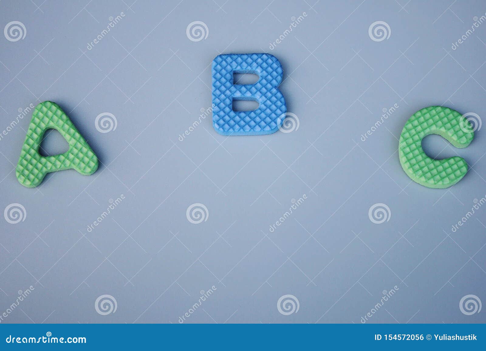 ABC - the First Letters of the English Alphabet on a Blue Background ...