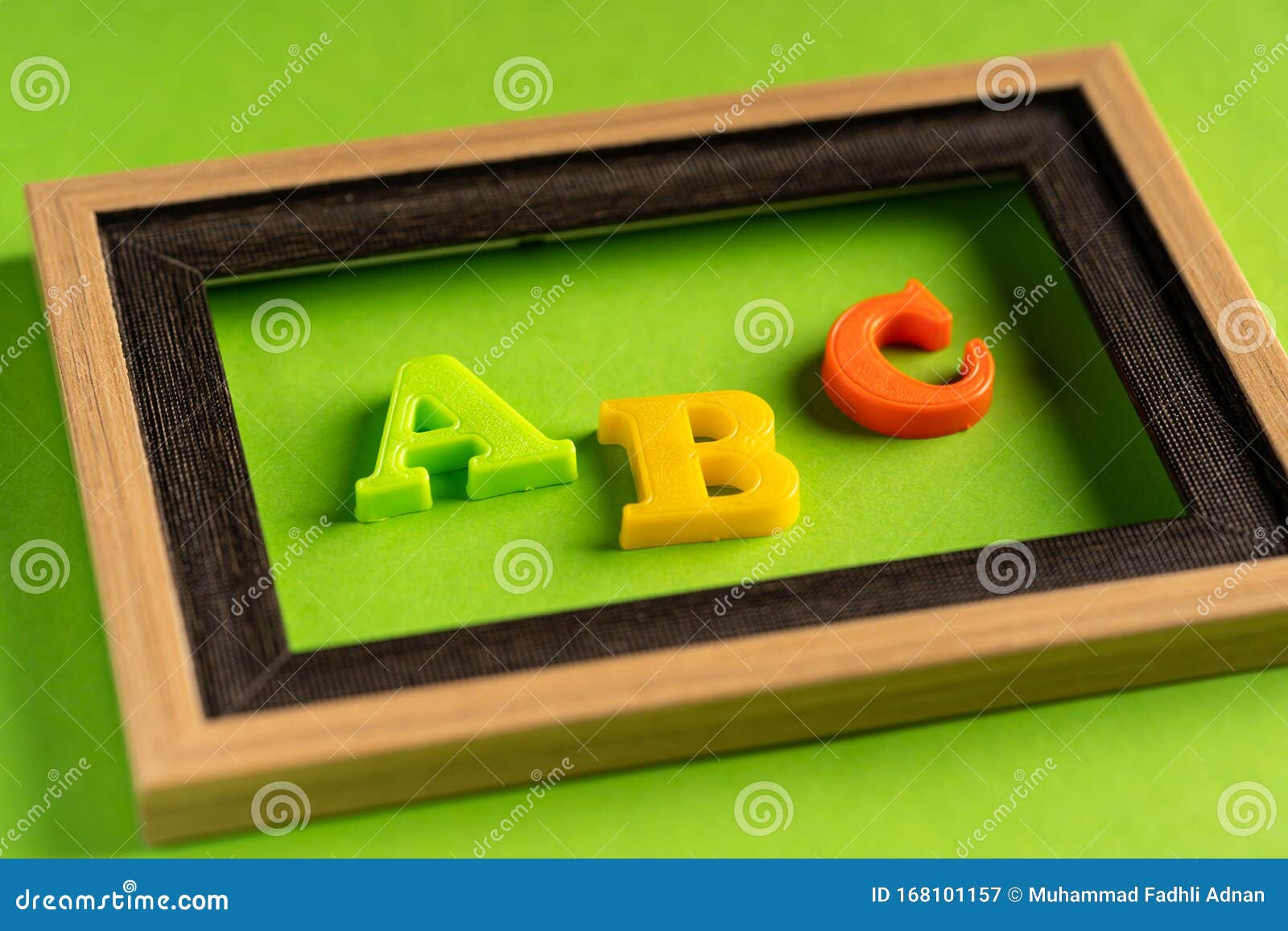 ABC on green background stock image. Image of cube, letter - 168101157