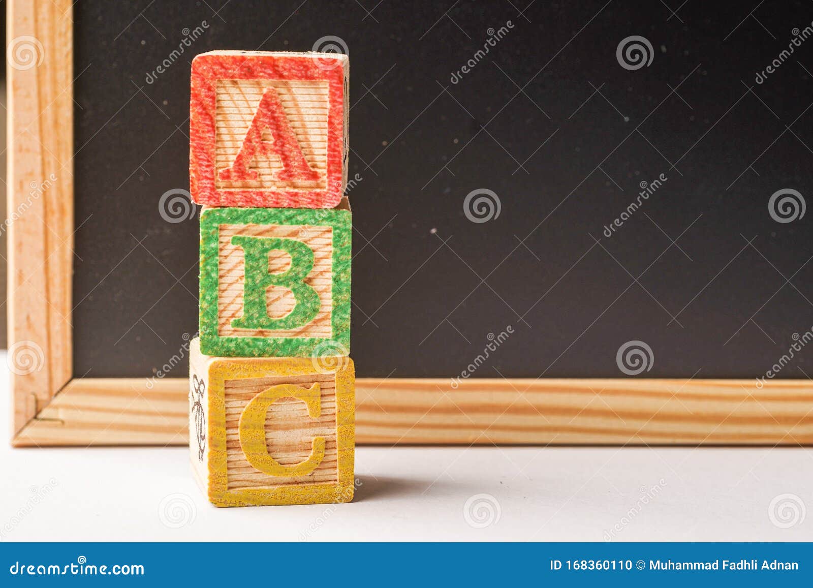 ABC Wooden Blocks Against Chalkboard Stock Photo - Image of copy ...