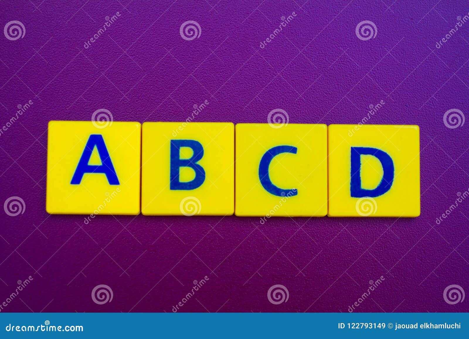 ABCD Spelling on Yellow Plastic Cubes Stock Image - Image of learning ...