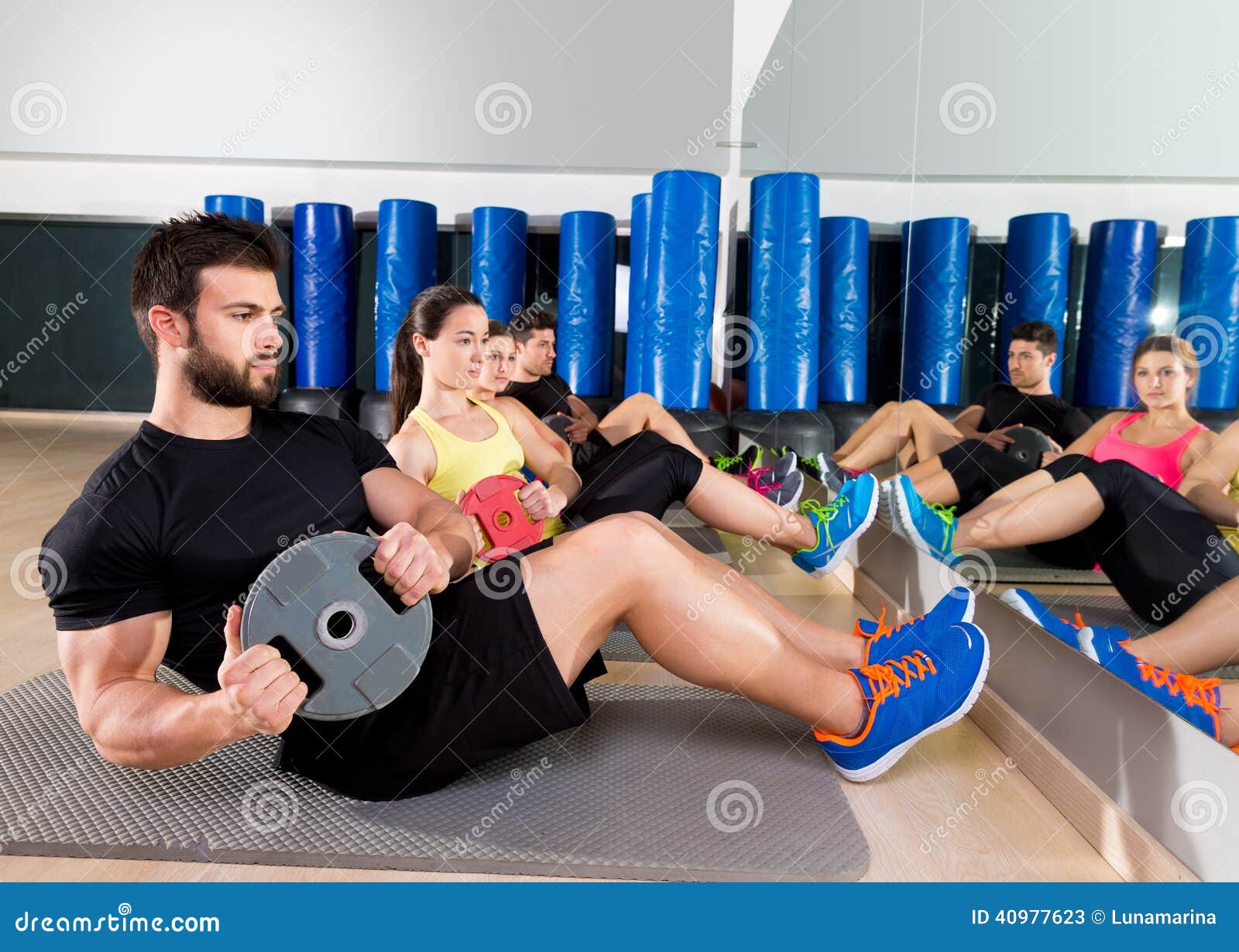 Abdominal Plate Training Core Group at Gym Stock Image - Image of ...