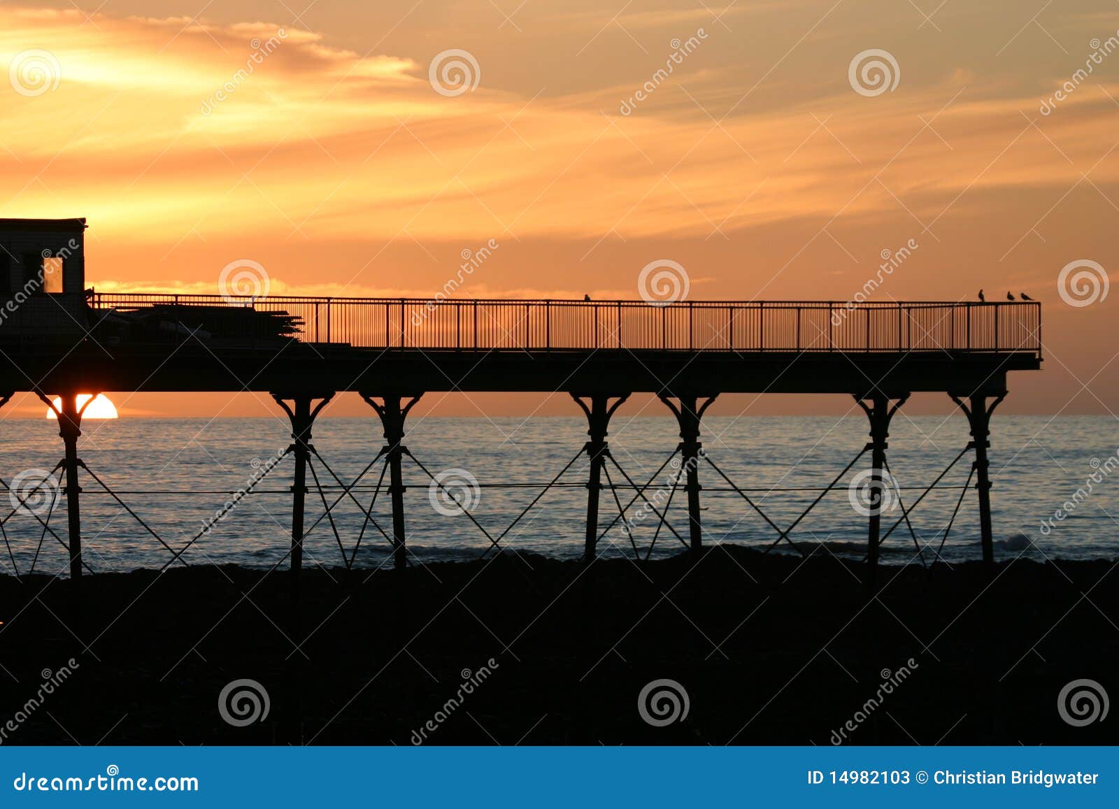 Aberystwyth pier at sunset stock image. Image of structure - 14982103