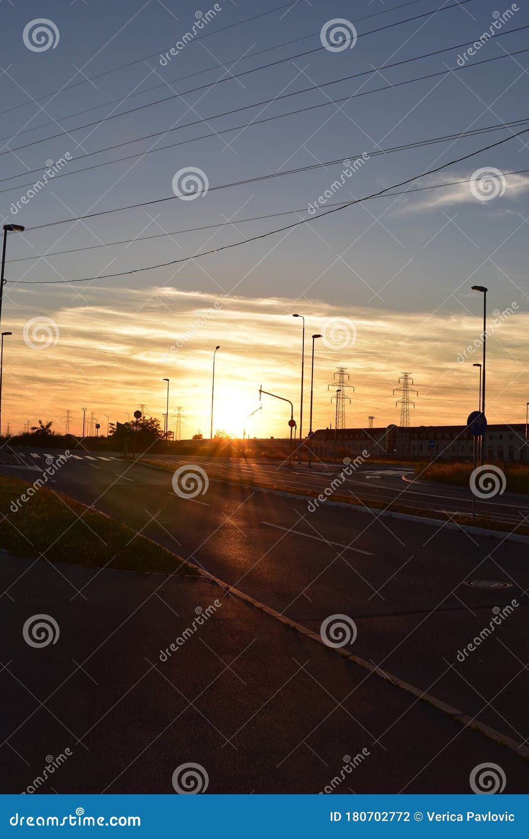 Above the Empty City Intersection is a Sky with Warm, Orange-gray ...