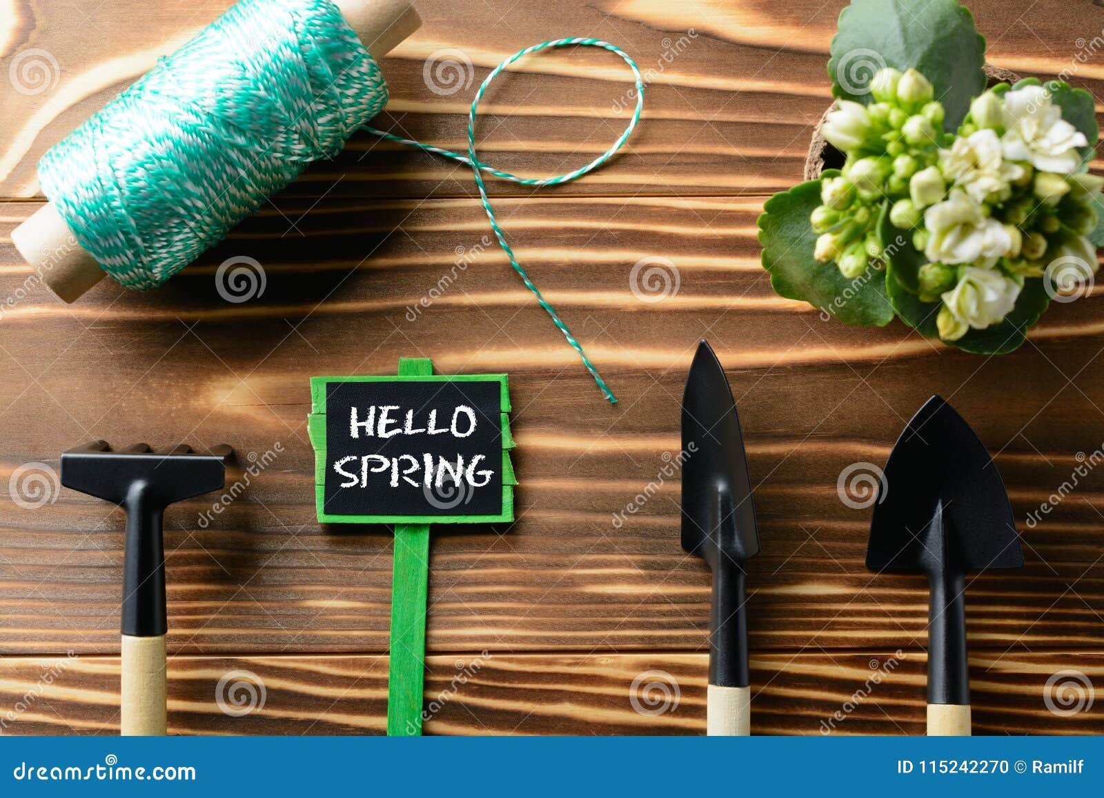 Hello Spring Sign with Tools on Table Stock Photo - Image of rope ...