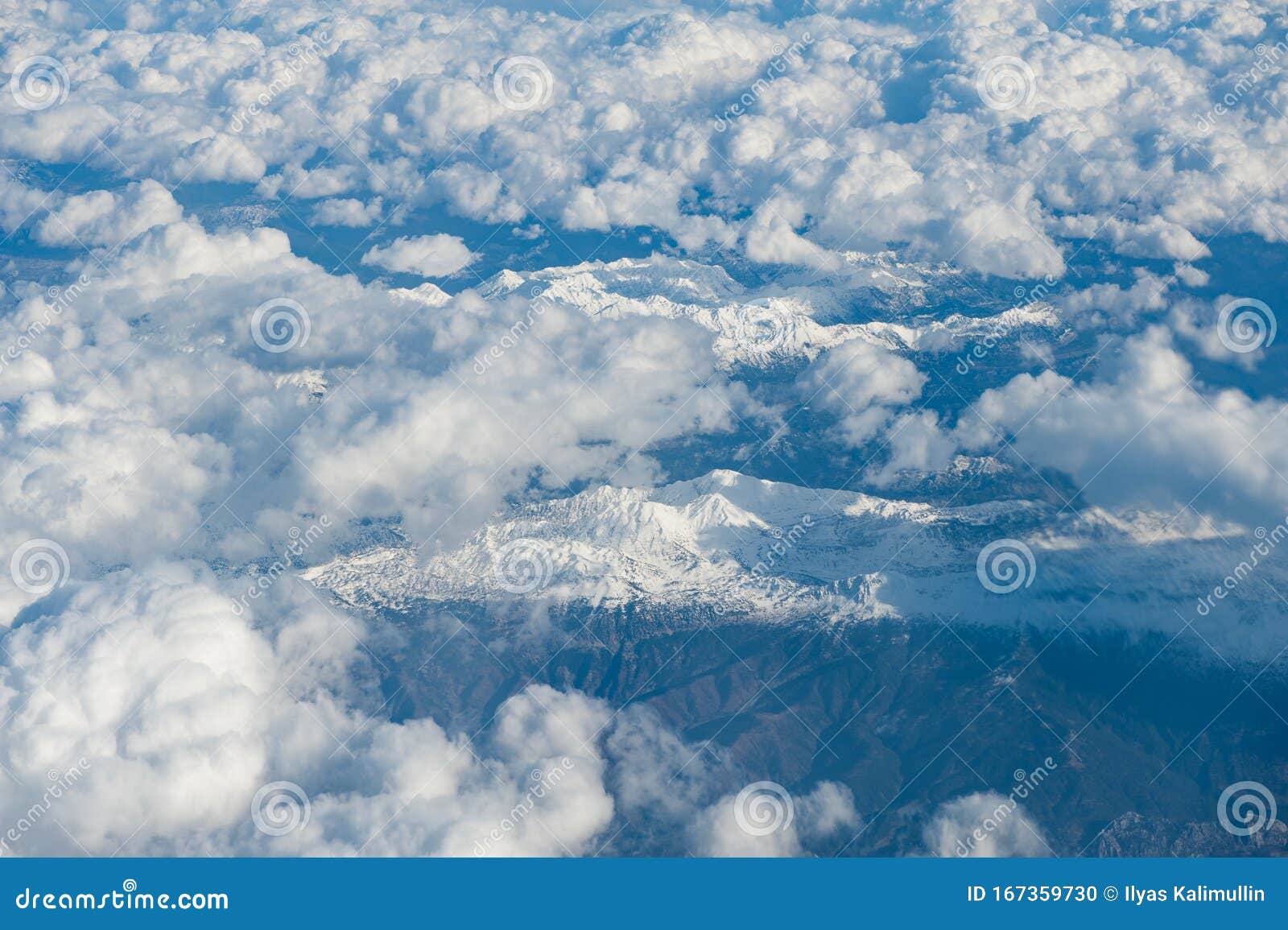 Above View of Clouds Over Rocky Mountains Stock Photo - Image of snow ...
