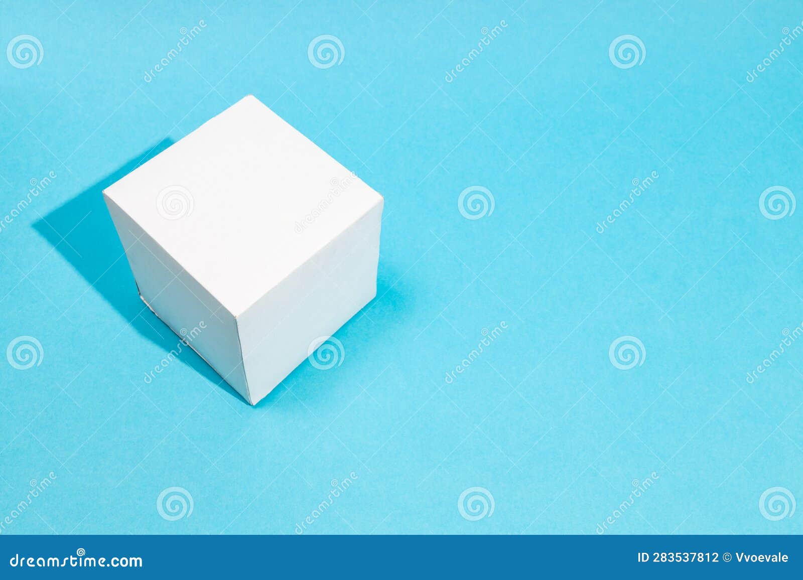 Above View of Hand-crafted Paper Cube on Blue Stock Photo - Image of ...