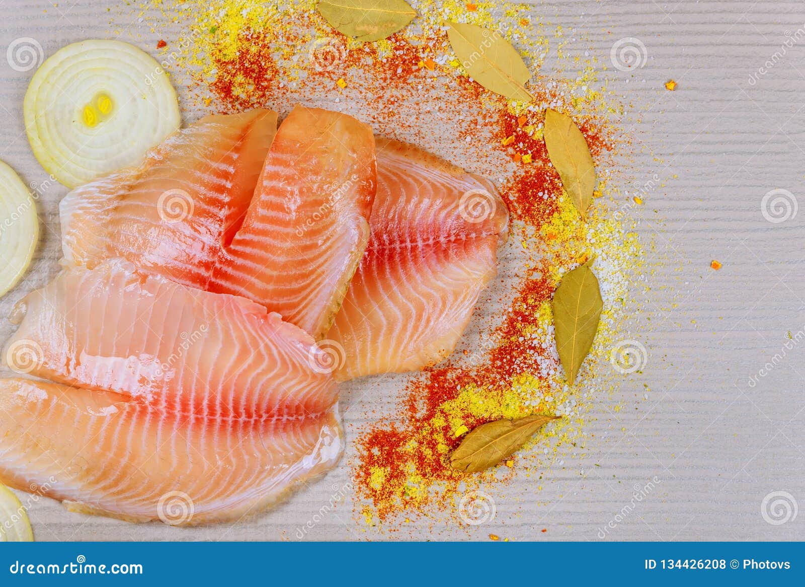 Above View of Raw Fresh Tilapia Fillets Over on Cutting Board Stock ...