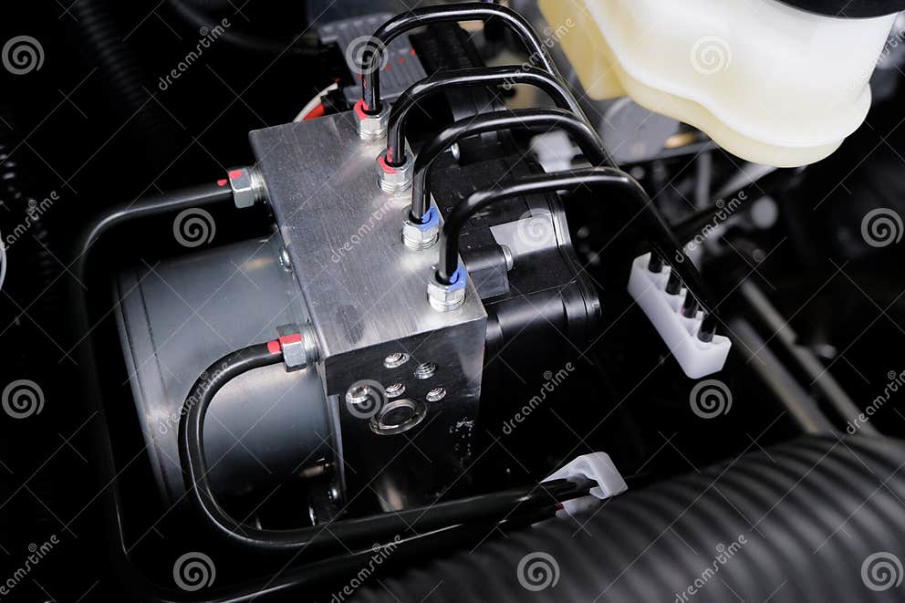 ABS Motor Control Module in the Car ( Anti-lock Brake System). Braking ...