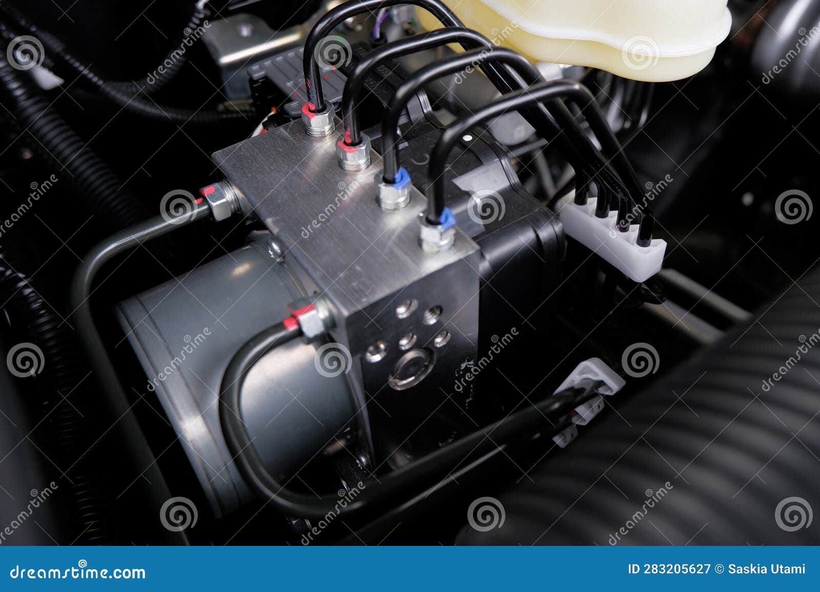 ABS Motor Control Module in the Car ( Anti-lock Brake System). Braking ...