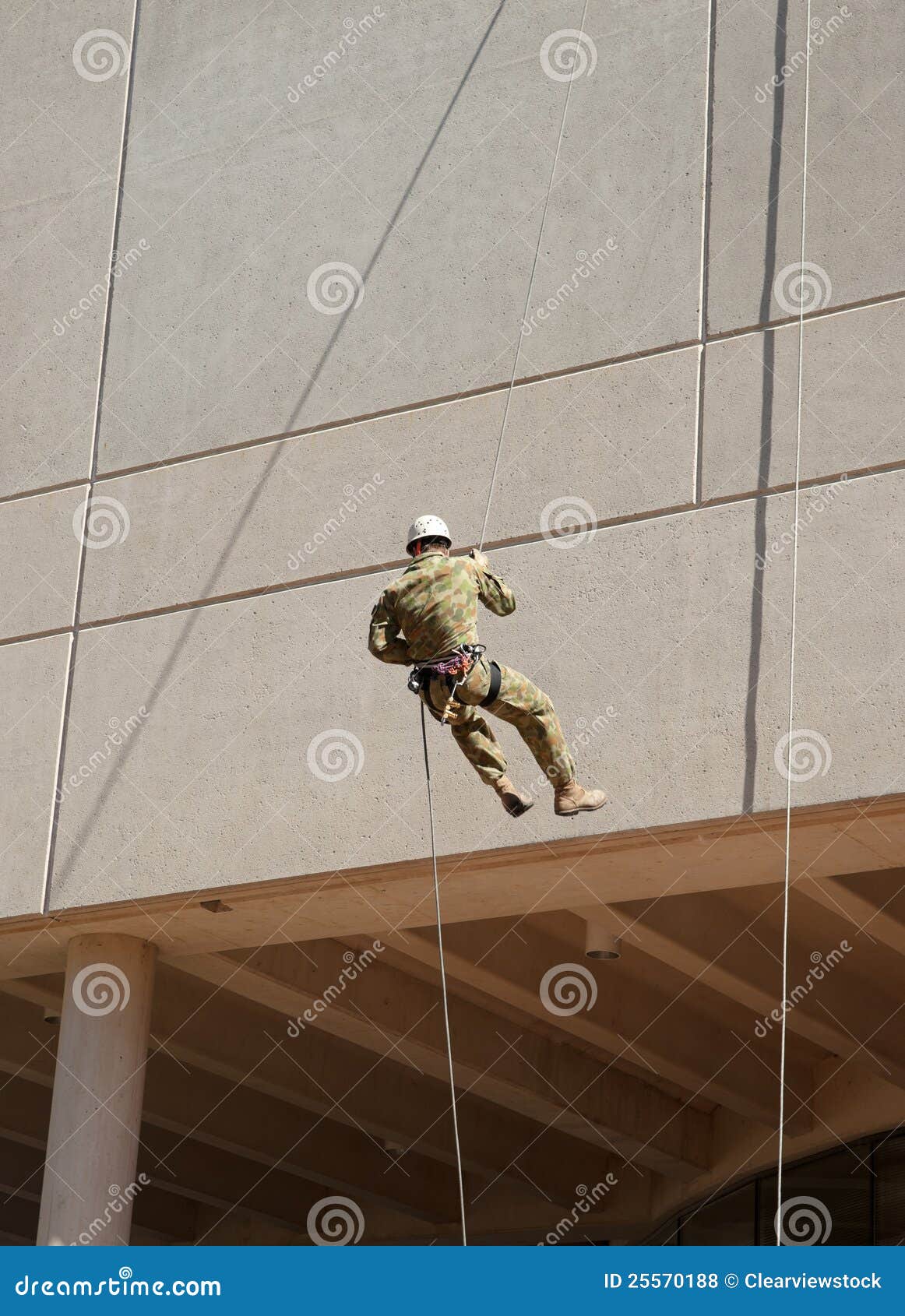 Abseiling down the wall stock photo. Image of camo, camouflage - 25570188