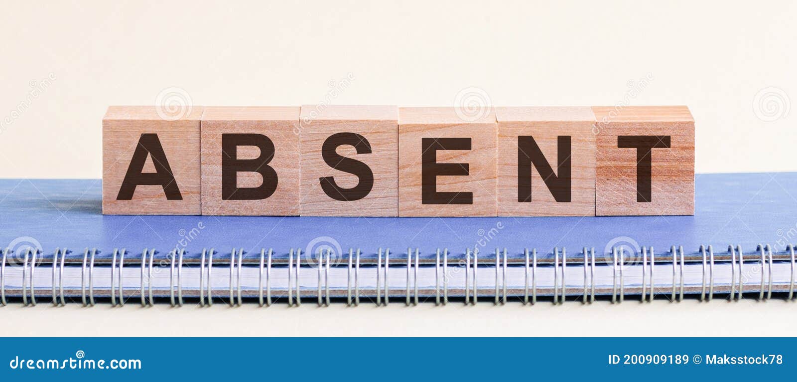 ABSENT - a Word Made of Wooden Blocks with Black Letters, a Row of ...