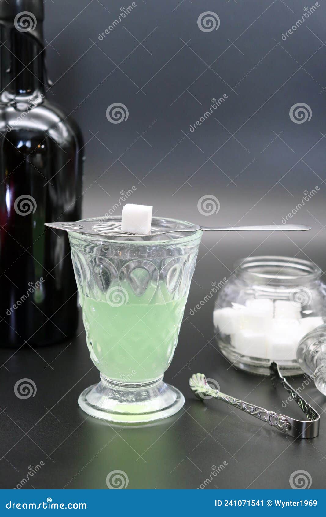 Absinthe in an Old Scratched Glass Stock Image - Image of drunk, green ...