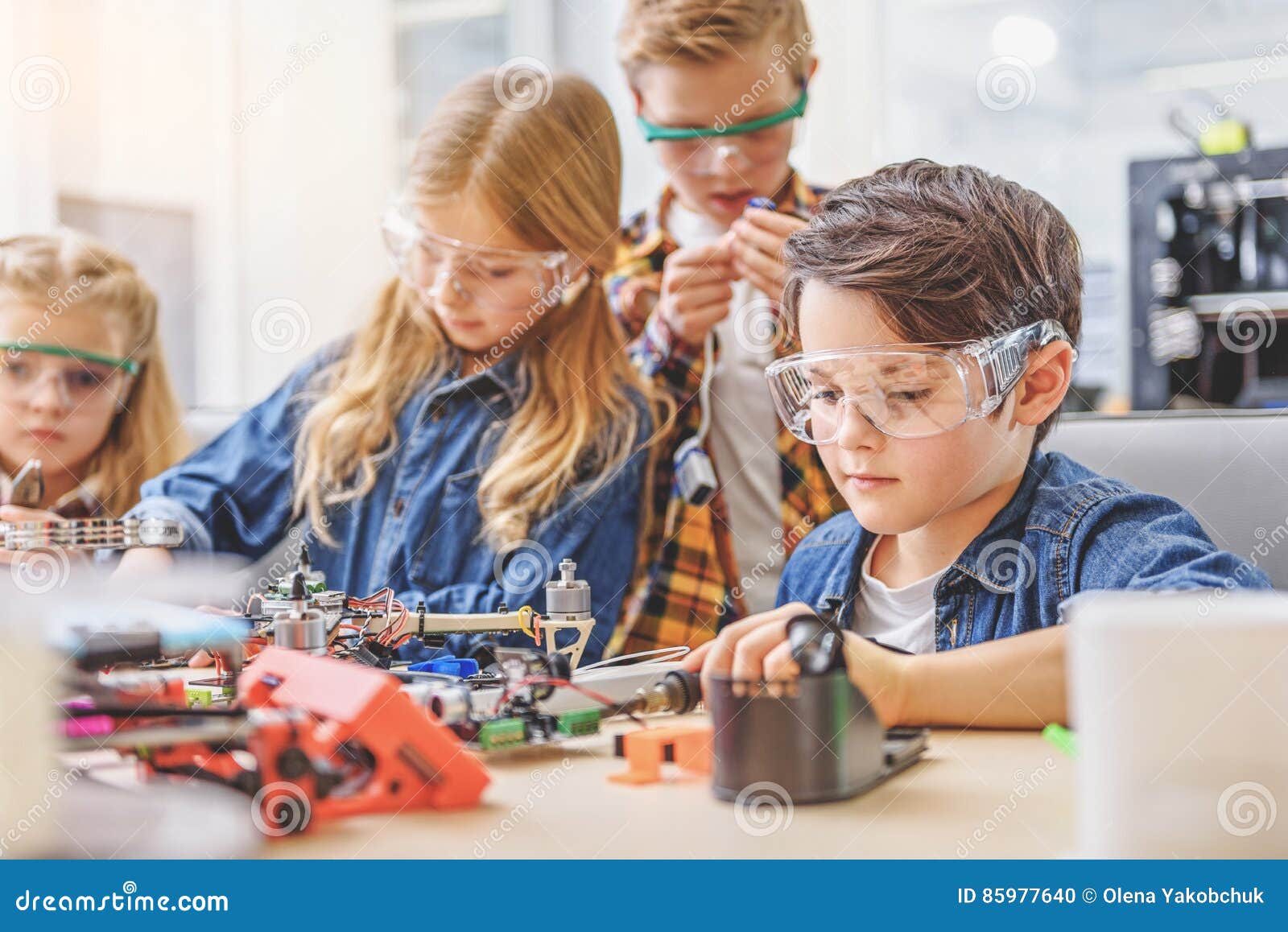 Absorbedly Working Children in Workshop Stock Photo - Image of drone ...
