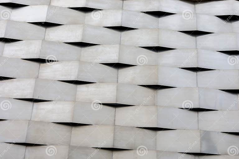Abstract Architectural Pattern of Interlocking Concrete Blocks Creating ...