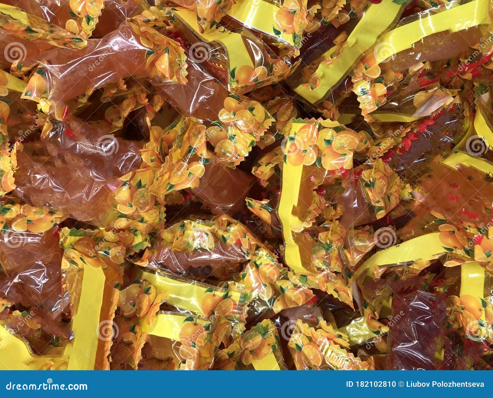 Abstract Background Candies in Bright and Shiny Packaging Stock Photo ...