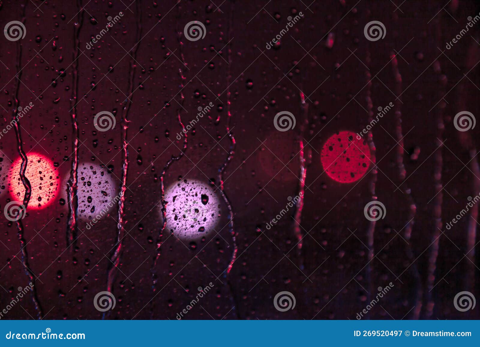 Abstract Background with Color Raindrops on Window and Night Blurred ...