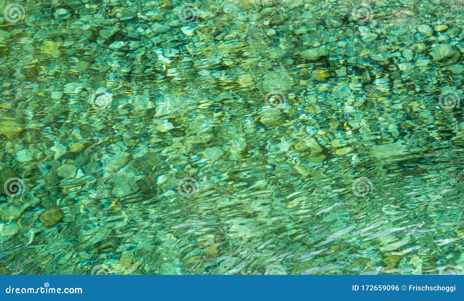 Abstract Background with Crystal Clear Emerald Ripply Water Surface ...