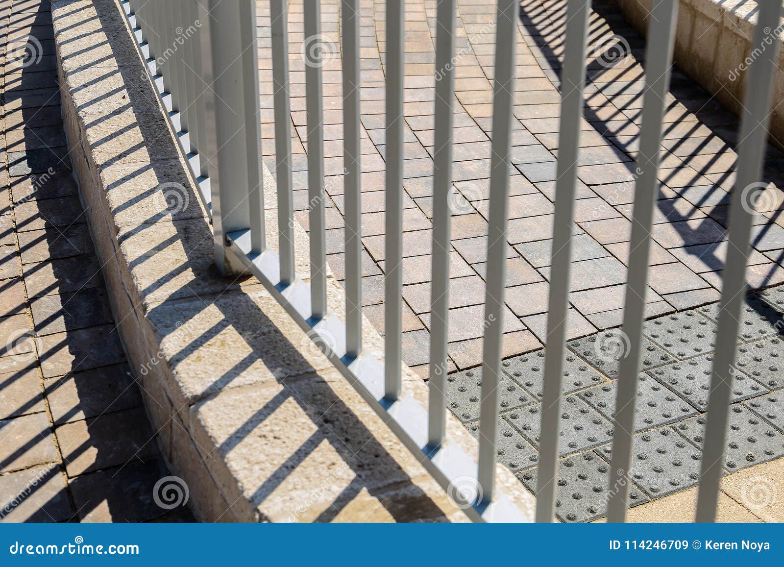 Parallel Lines and Their Shadows on the Ground Stock Image - Image of ...