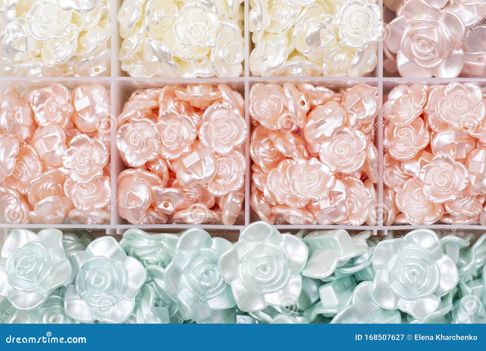 Abstract Background. Light Plastic Buttons in Delicate Colors in a Box ...