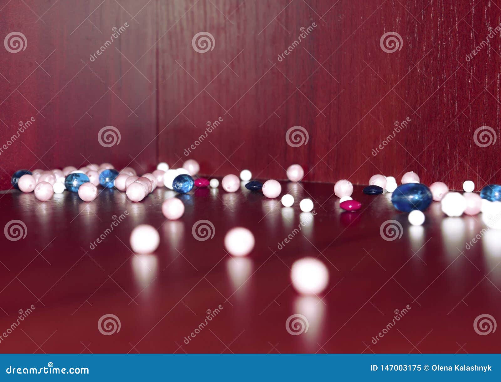 Abstract Background of Loose Beads and Pearls on Dark Backdrop. Blurred ...