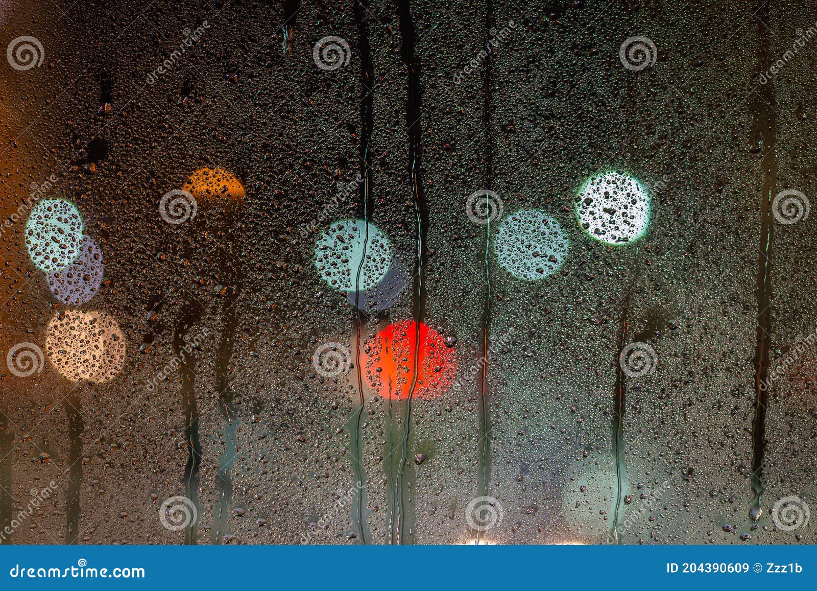 An Abstract Background of Night Wet Window Glass with Smudges Stock ...