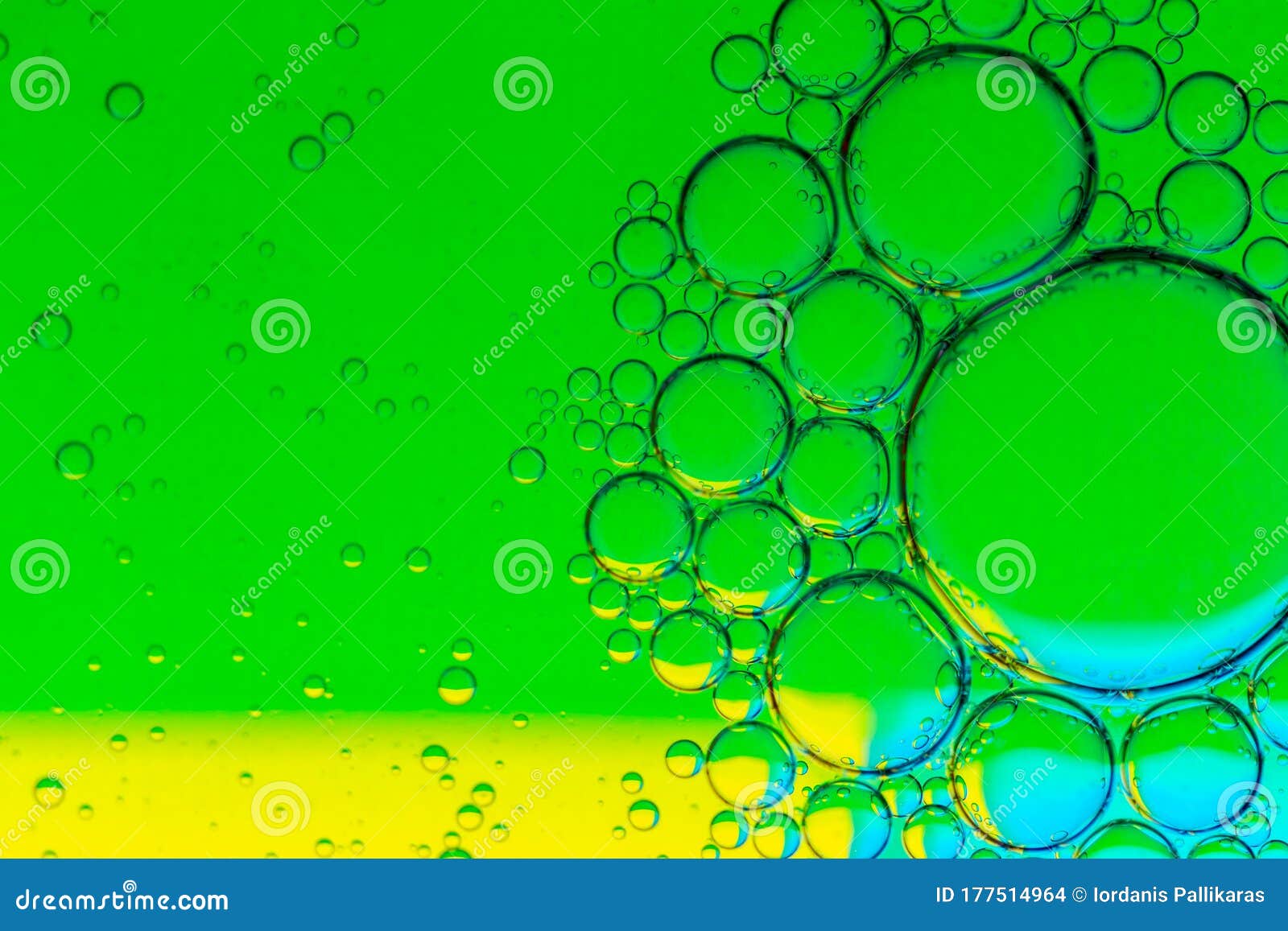 Abstract Background of Oil Bubbles on Water Surface Green Yelow Cyan ... Abstract Background of Oil Bubbles on Water Surface Green Yelow Cyan ...