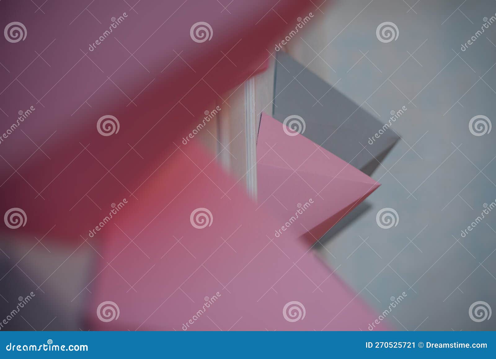 Abstract Background of Paper Polygons of Gray Pink, Different Shapes on a White Wall. Creative ...