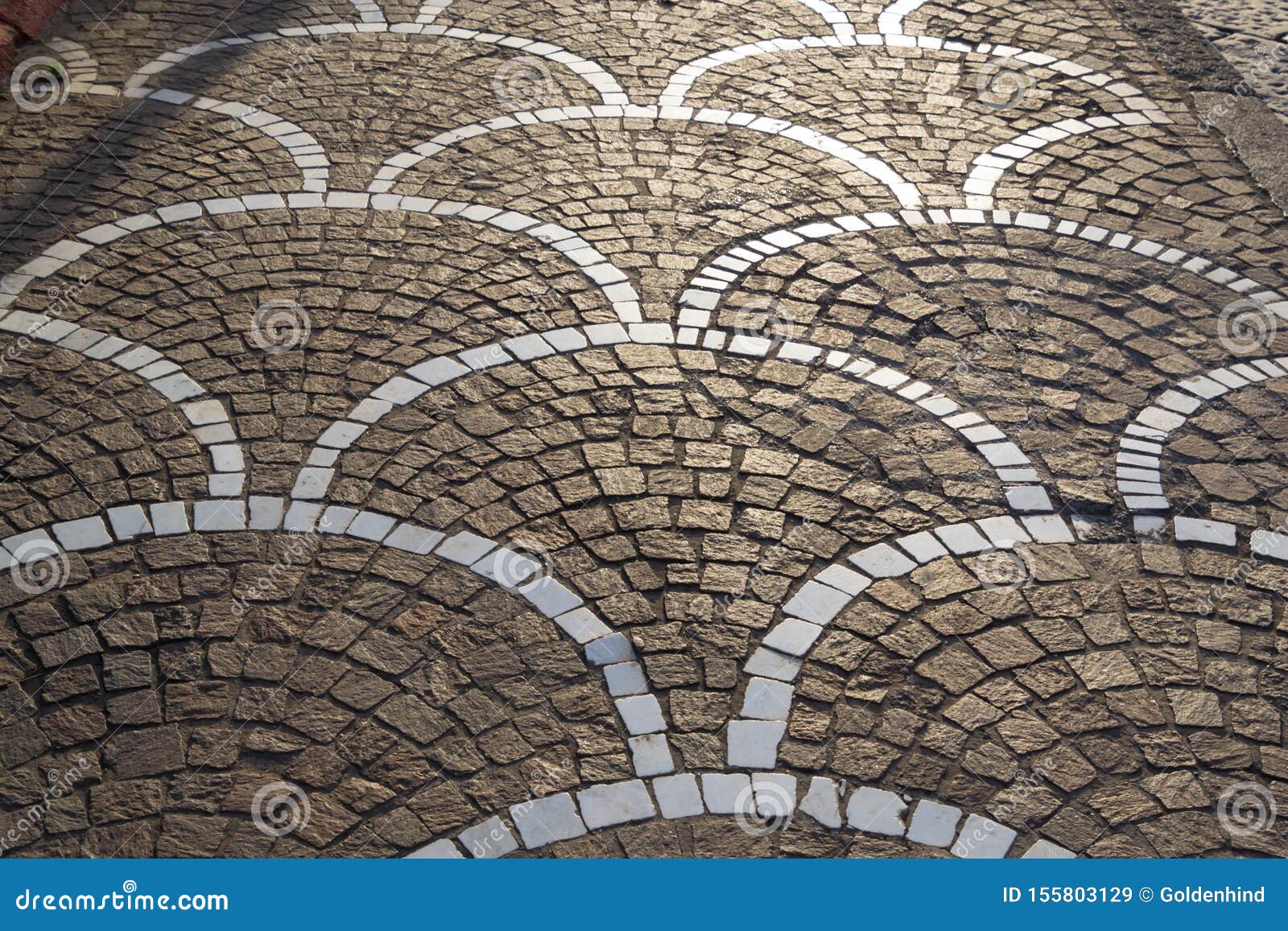 Abstract Background of Sunlight on the Cobblestone Pavement Road ...