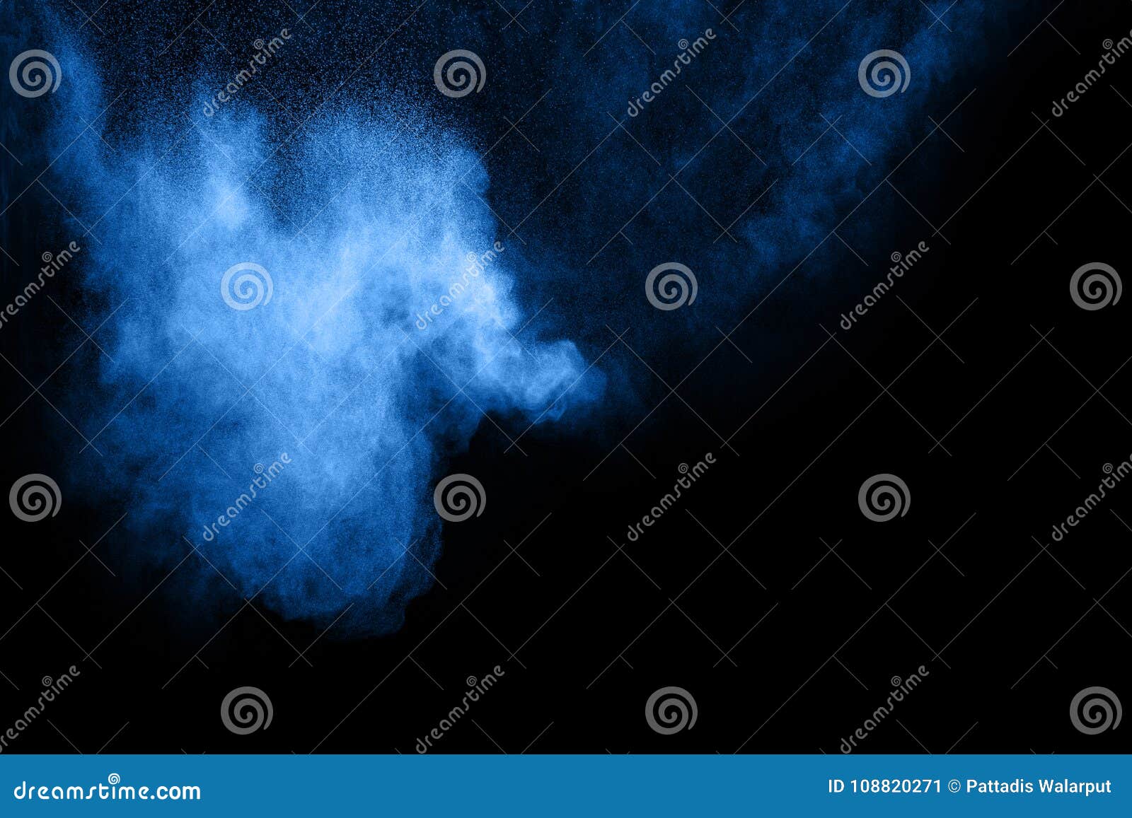 Abstract Blue Dust Explosion on Black Background. Stock Image - Image ...