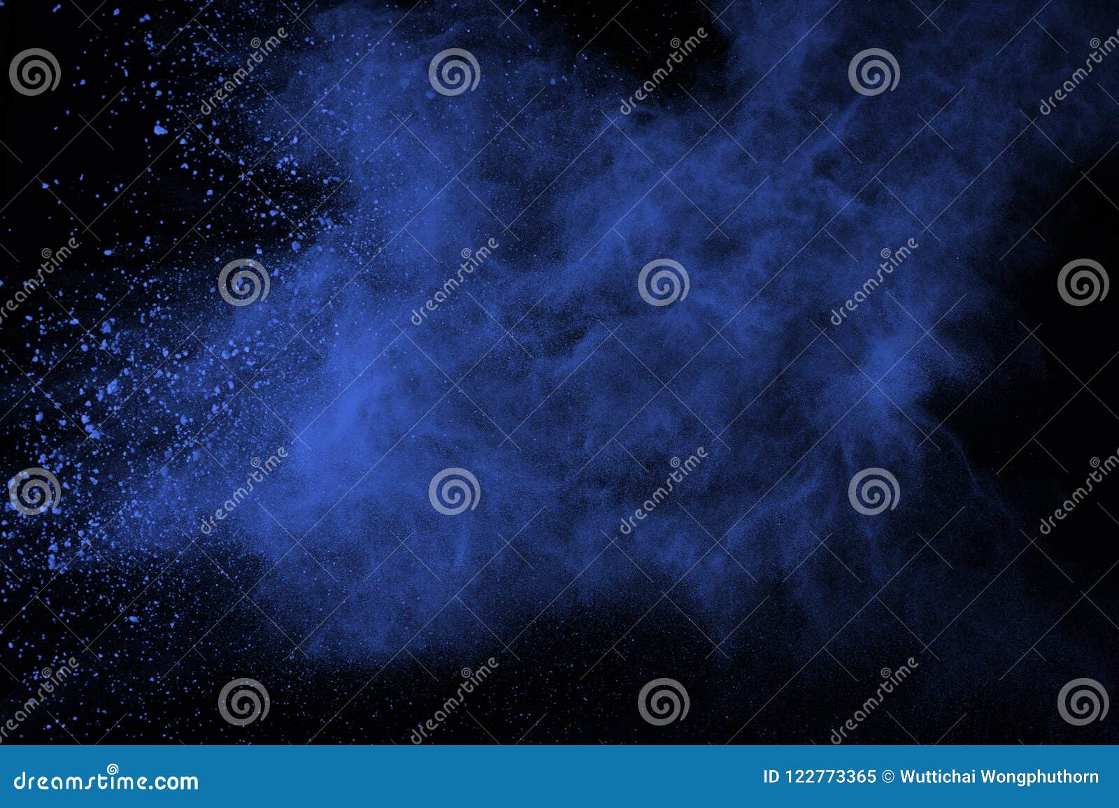 Abstract of Blue Powder Explosion on Black Background. Blue Powder ...