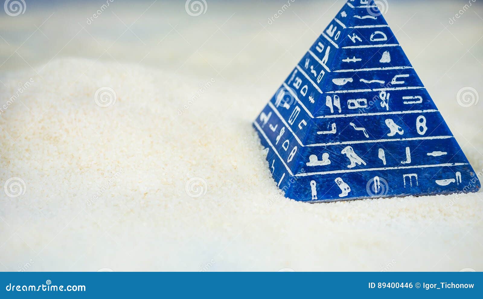 Abstract Blue Pyramid with Hieroglyph Staying on Sand Stock Photo ...