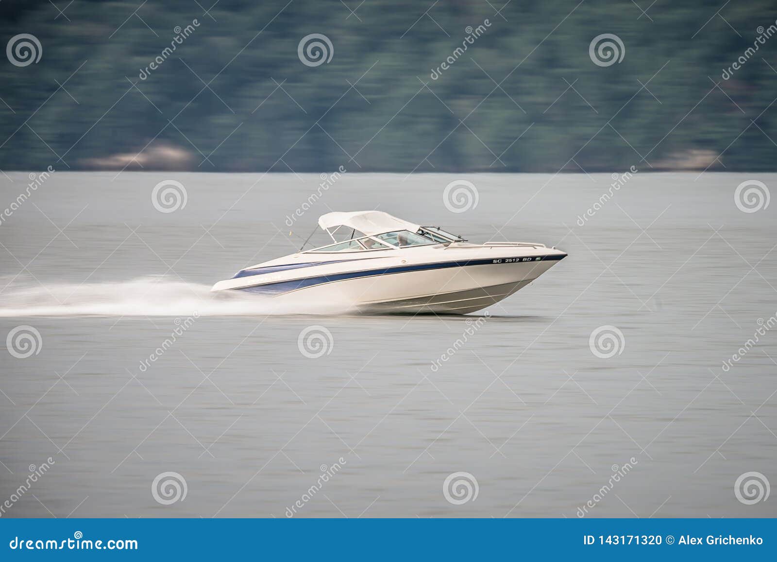 Abstract Blur of Nature and Fast Moving Boat on Lake Editorial Image ...