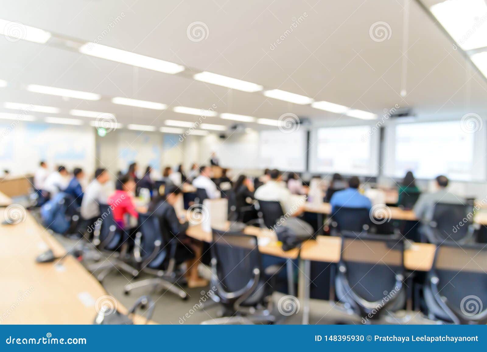 Abstract Blurred of Conference and Presentation in the Meeting Room ...