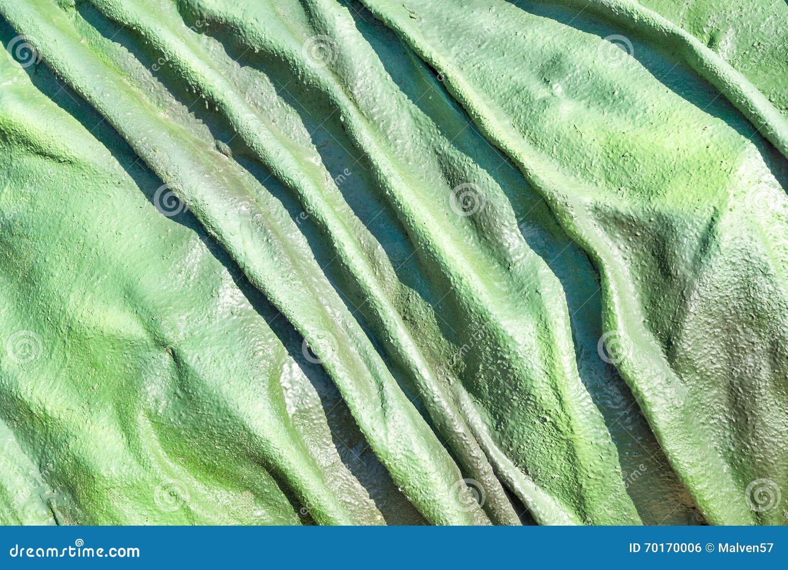 The Abstract Bumpy Textured Background of Green Color Stock Photo ...