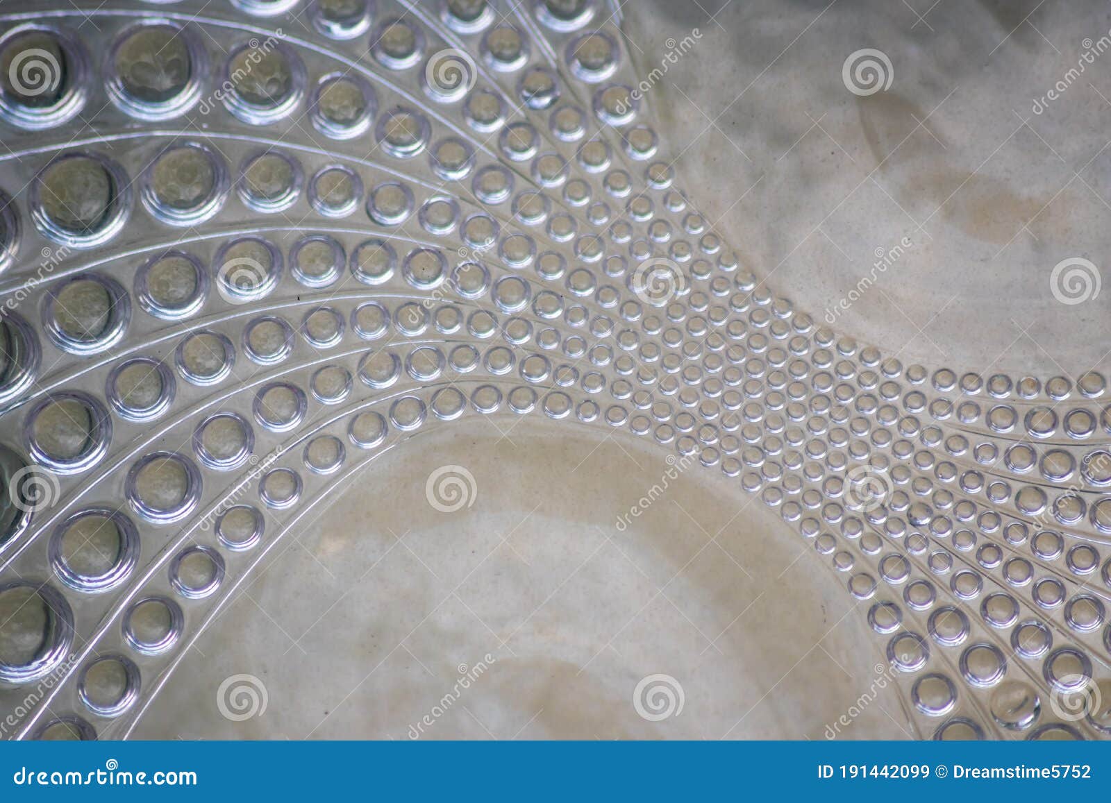 Abstract Circle Pattern in a Glass Brick As Glass Background Shows a ...