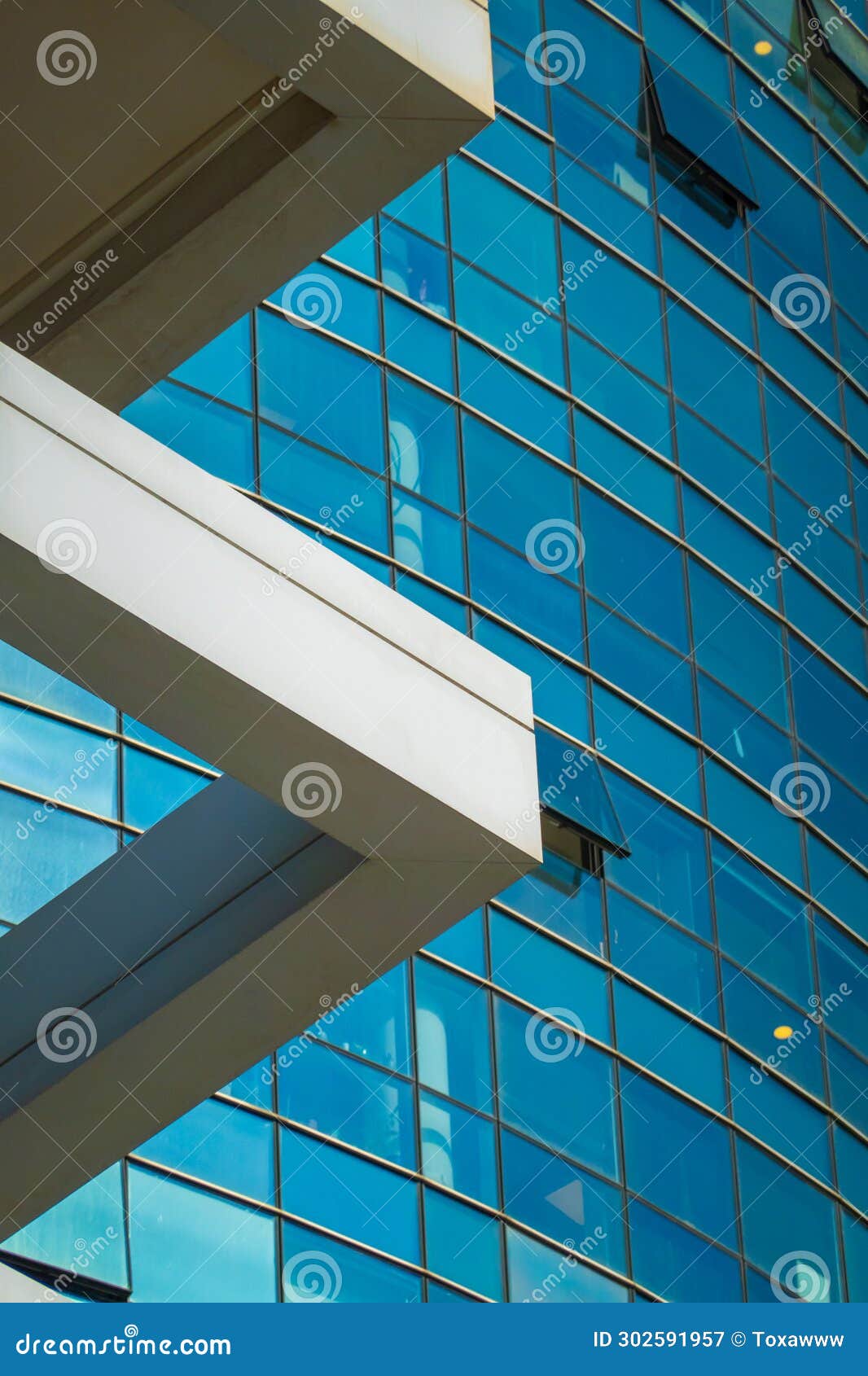 Abstract Close-up of a Modern Glass Building with Reflective Windows ...