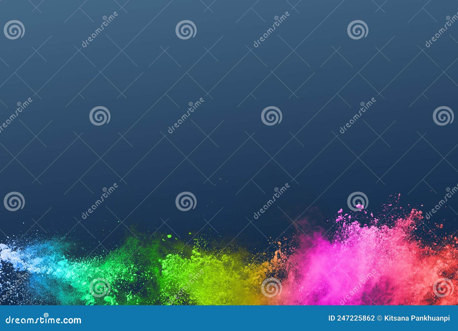 Abstract Colored Dust Explosion on a Blue Background Stock Photo ...