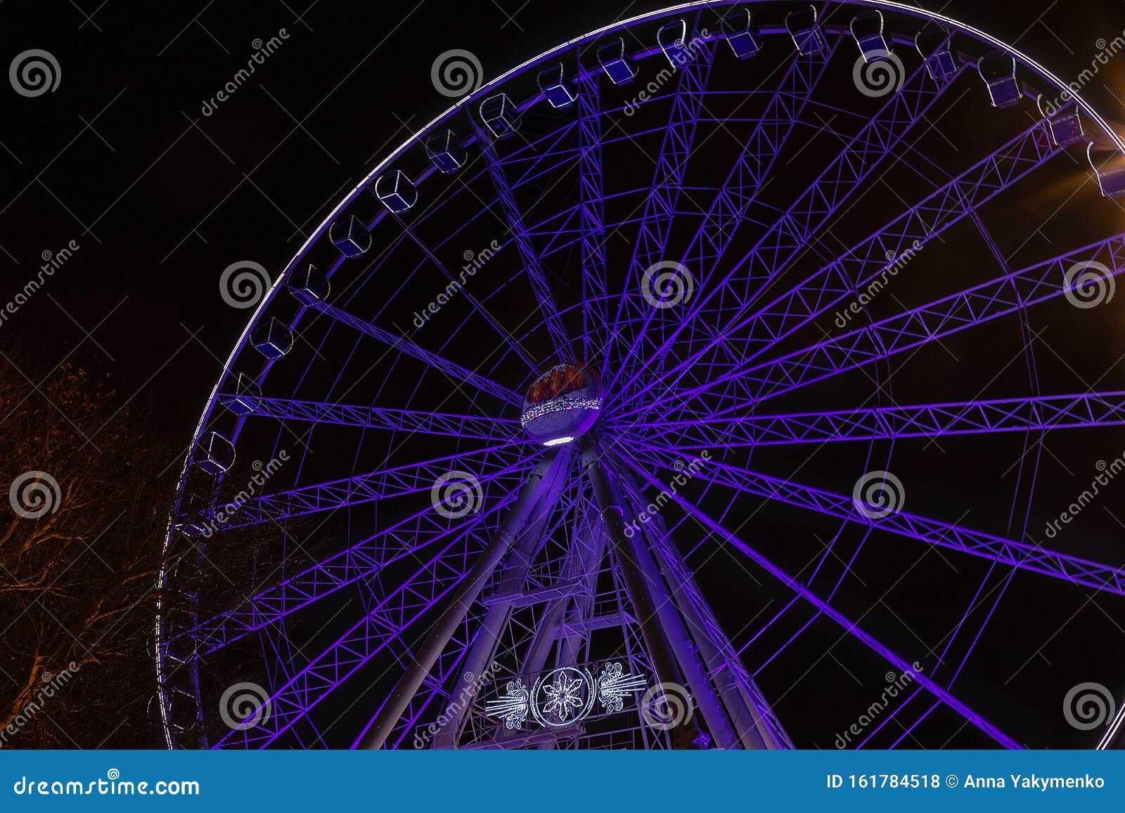 Abstract Colorful Background with a Circle of Ferris Wheels on a Sky ...