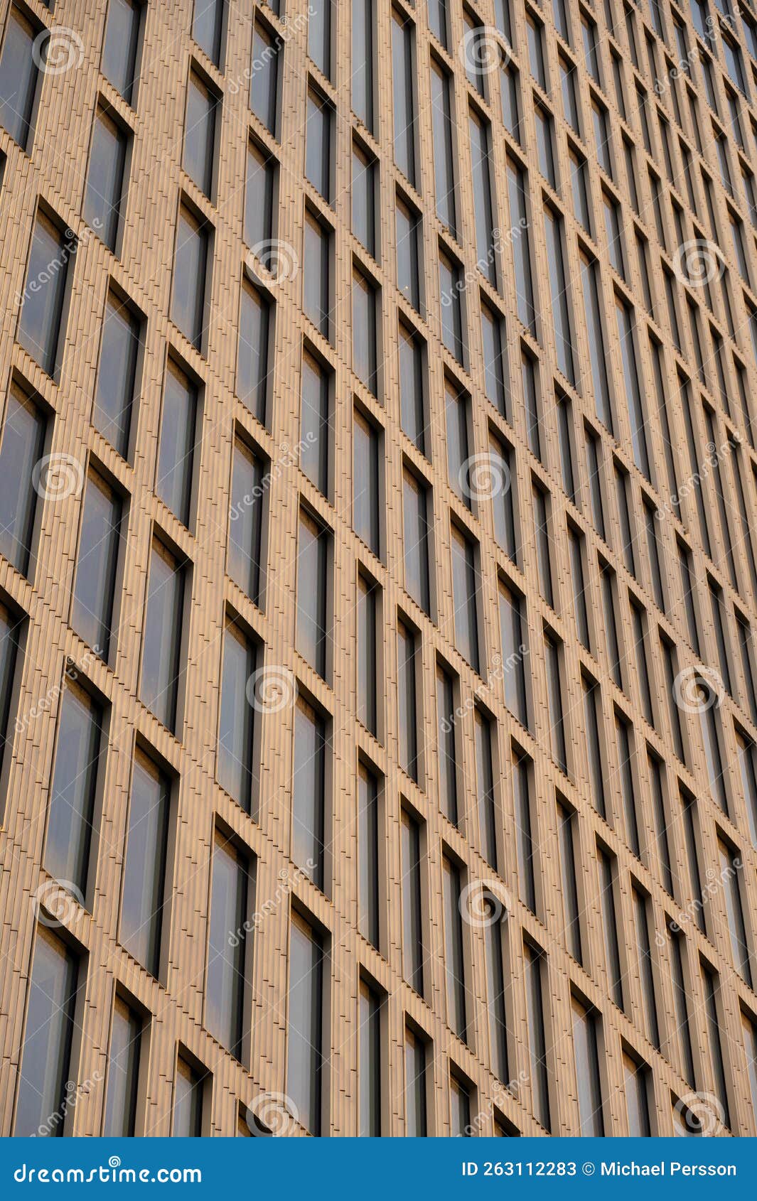 Abstract Facade with Windows and Textured Wall in Sunset Stock Image ...