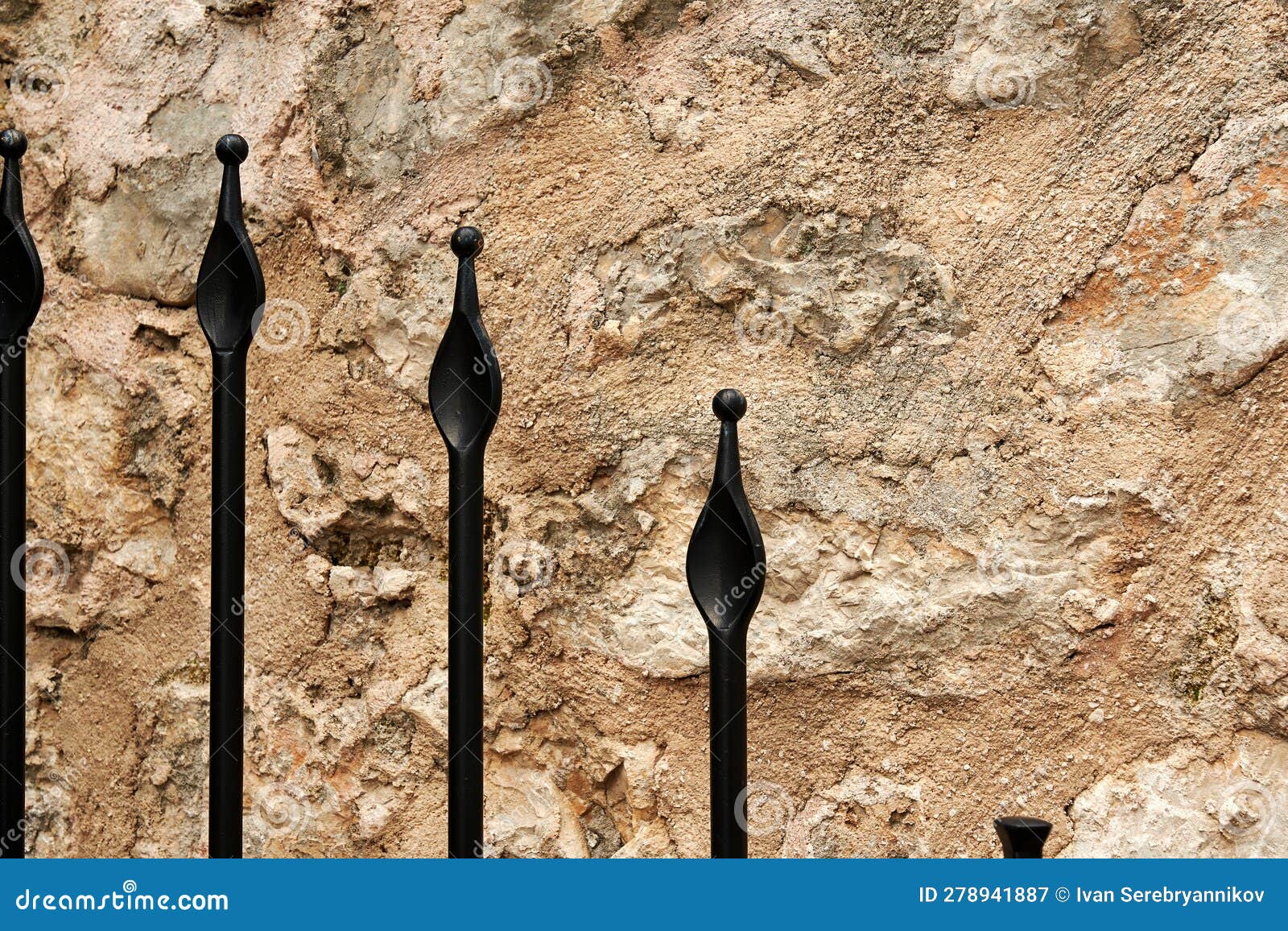Abstract Fence Background with Stone Wall and Metallic Spears Stock ...