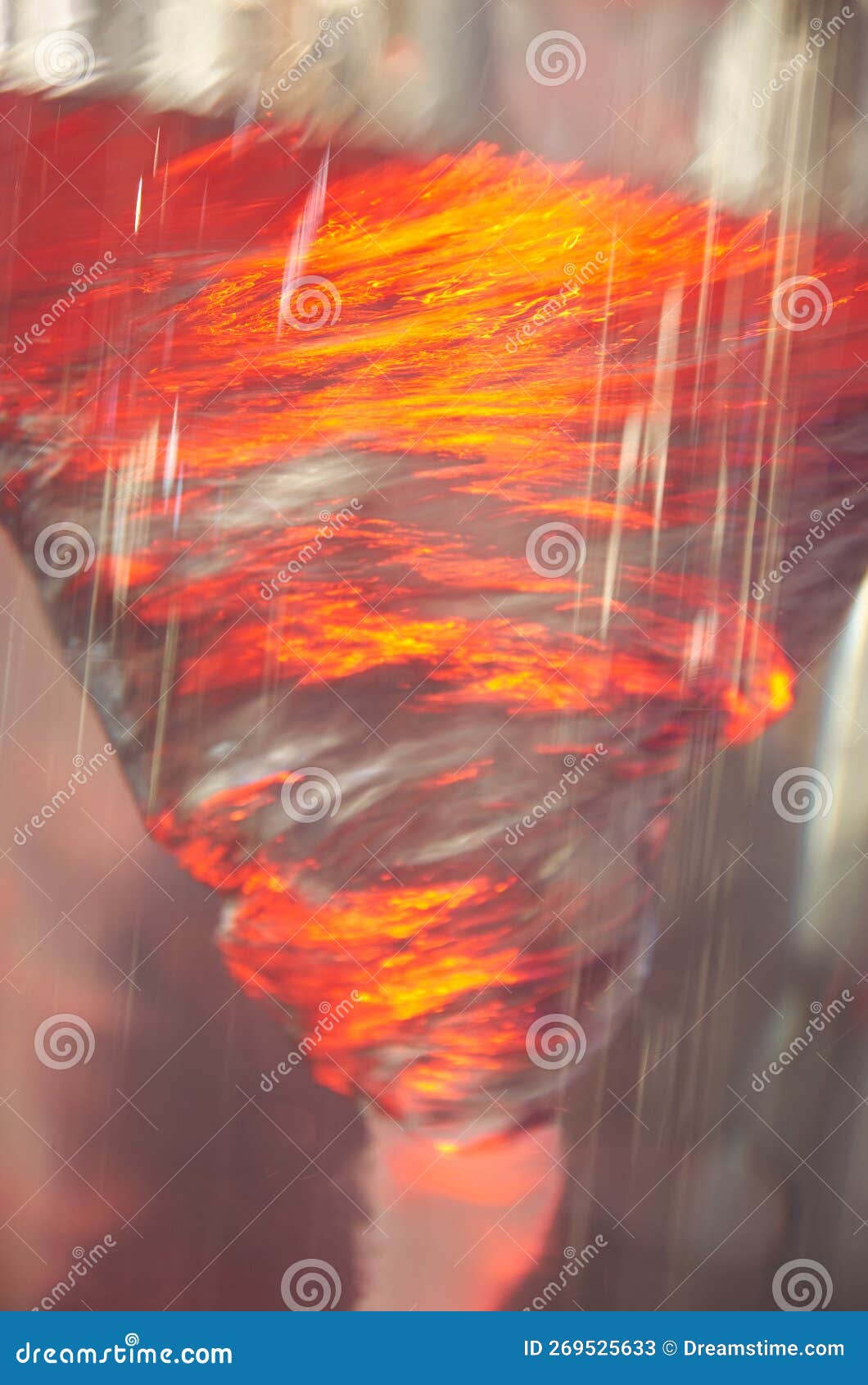 Abstract Fire and Ice of Water Swirling in a Tube of Blurry Vision ...